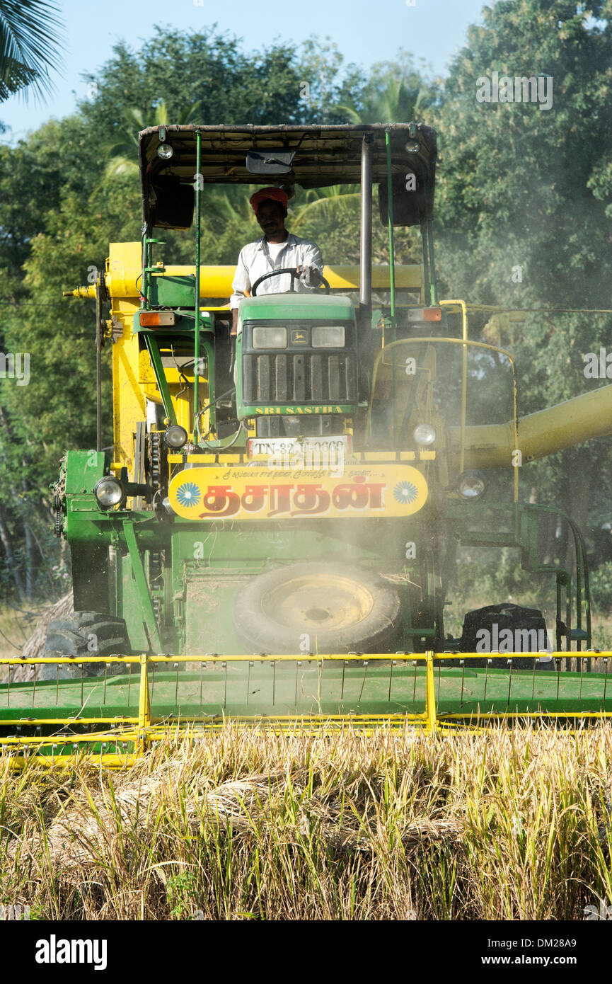 Indian Combine harvester harvesting rice crop. Andhra Pradesh, india ...