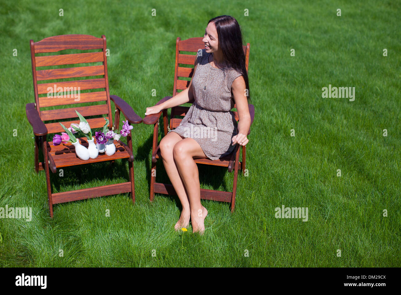 Woman alone outside sitting yard hi-res stock photography and images ...