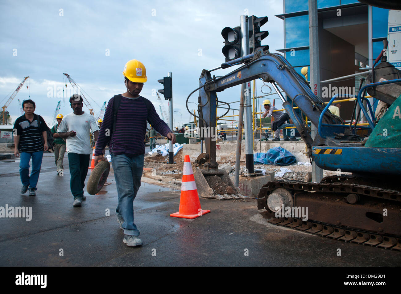 Migrant workers before their shift on construction sites in the Marina ...