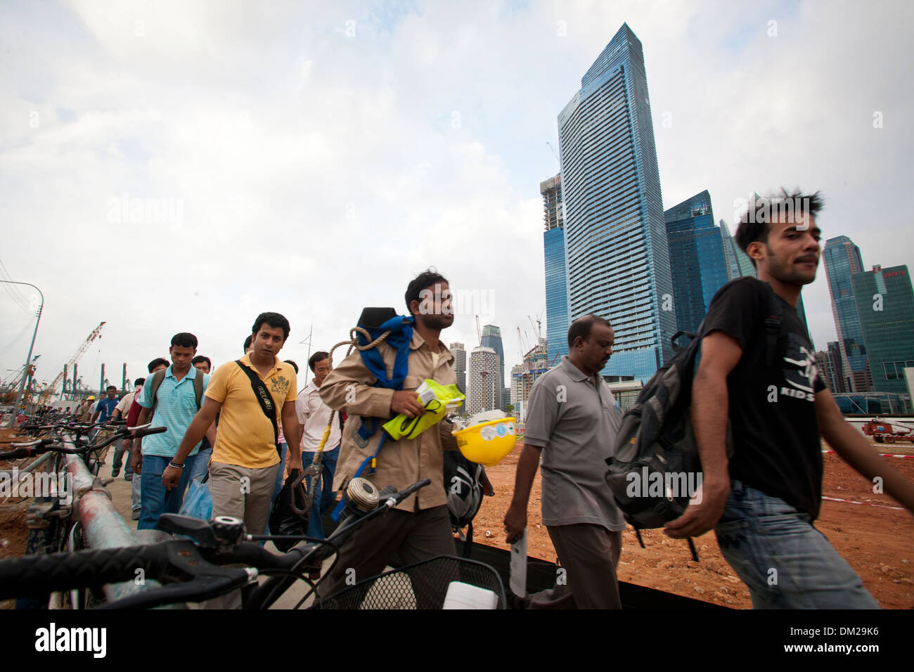 Migrant workers before their shift on construction sites in the Marina ...
