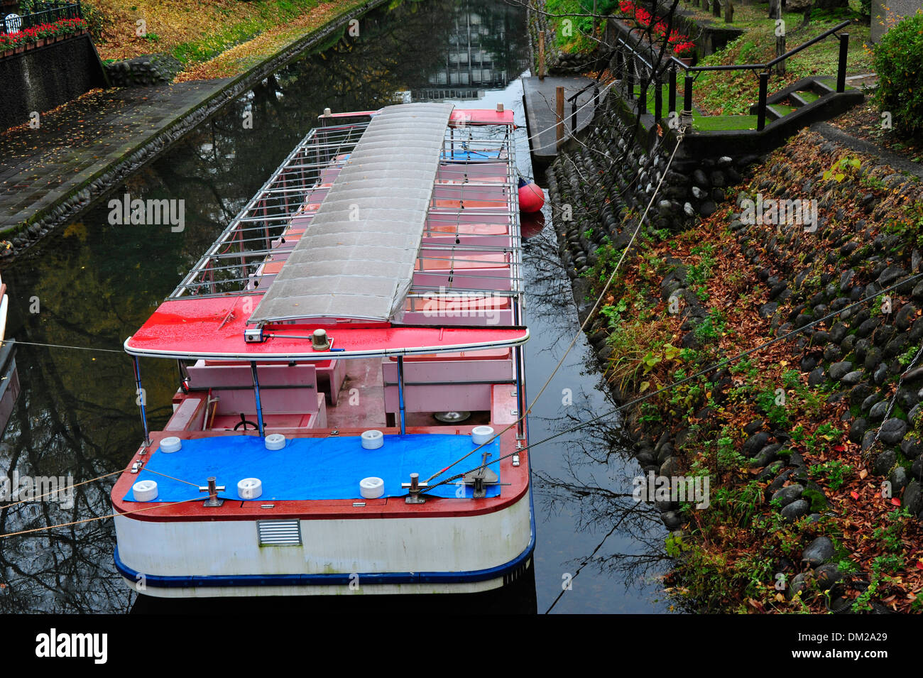 A tourist boat on the moat of Toyama Castle Stock Photo - Alamy