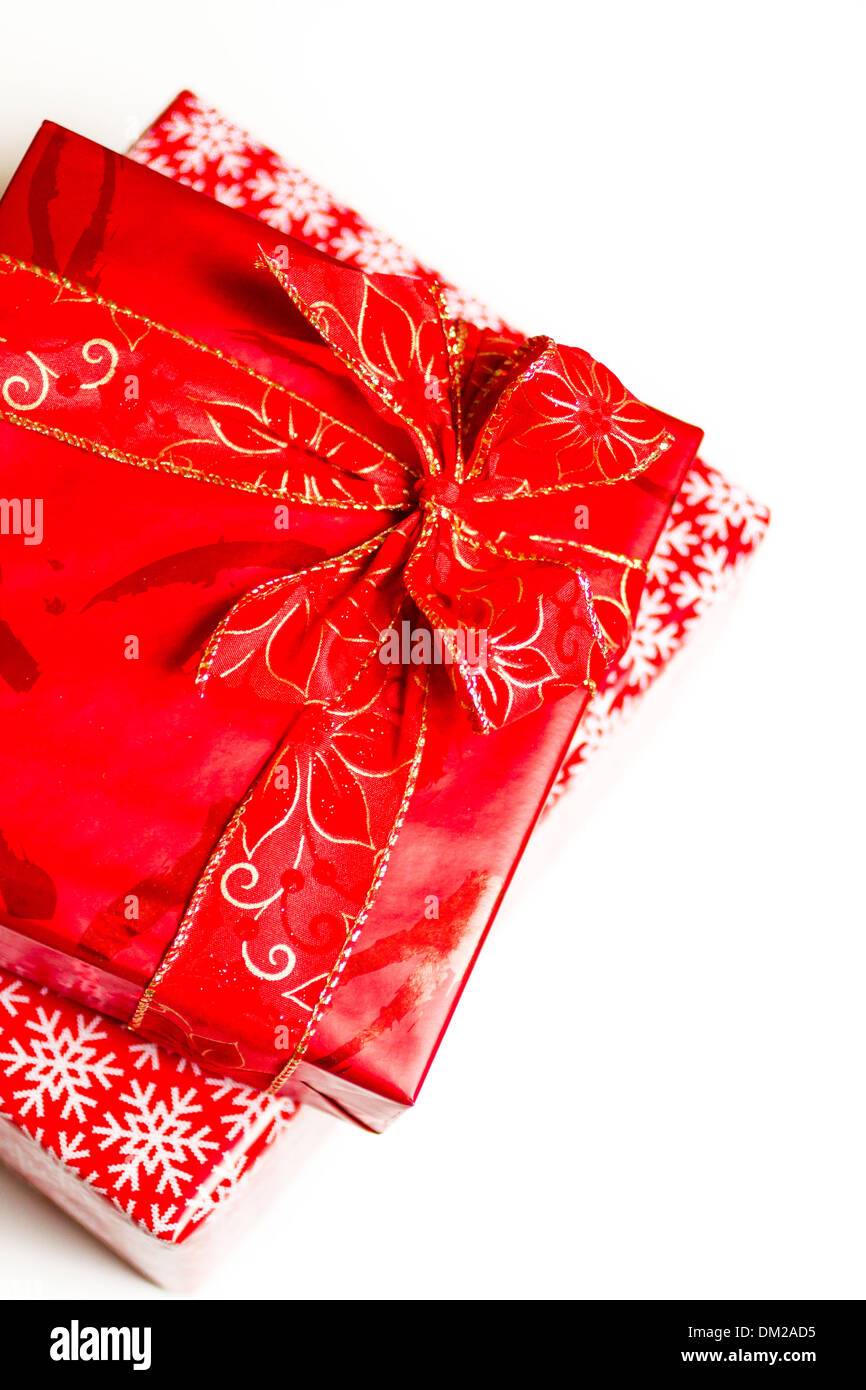Christmas presents wrapped in red paper Stock Photo - Alamy
