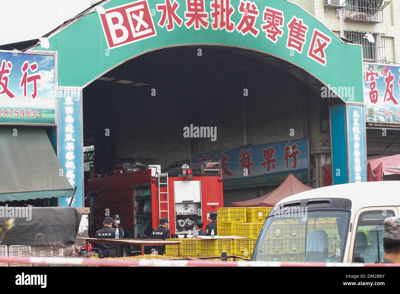 Shenzhen, China's Guangdong Province. 11th Dec, 2013. Policemen work at ...