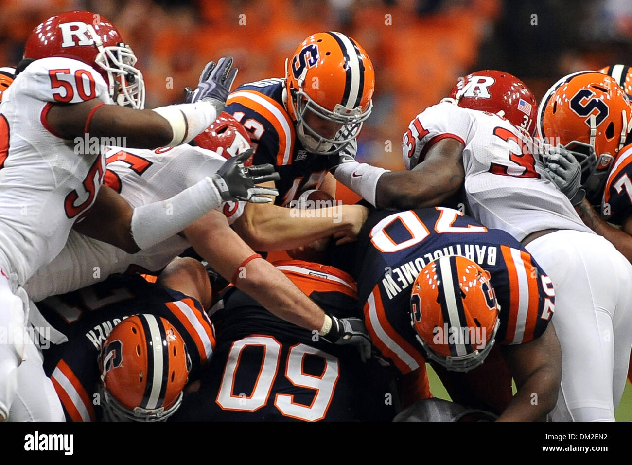 Syracuse quarterback Ryan Nassib (12) dives forward for a first down ...