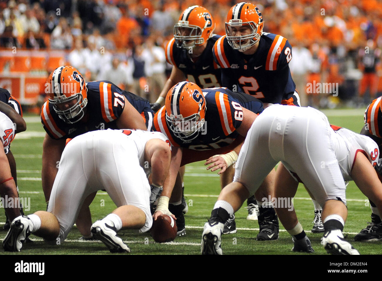 Syracuse quarterback Greg Paulus (2) lines up the Orange offense for a ...