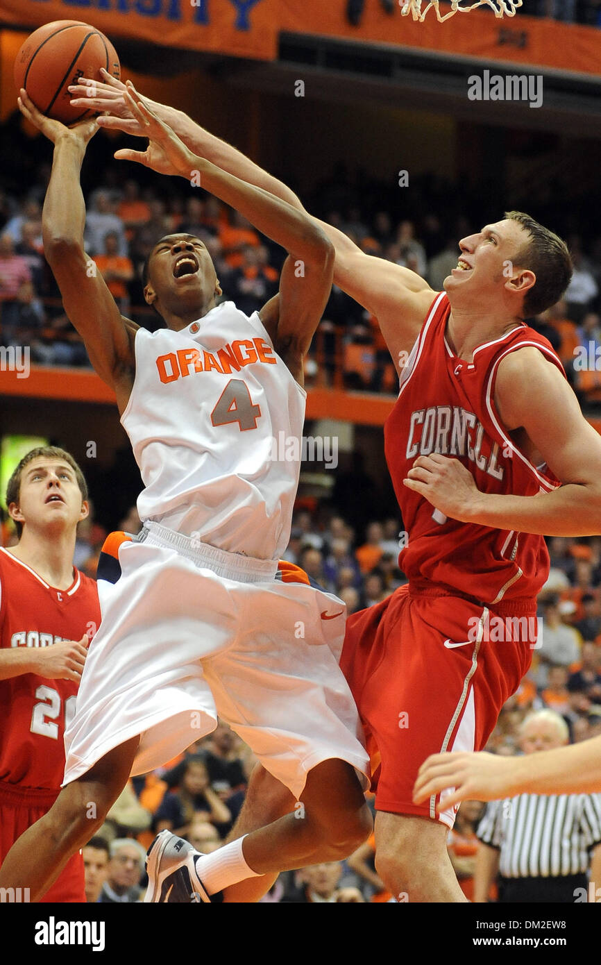 Syracuse forward Wesley Johnson (4) is fouled in the second half by ...