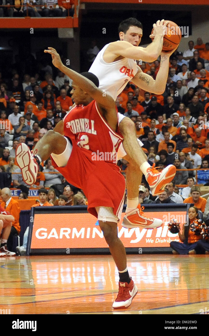 Syracuse guard Andy Rautins (1) is fouled at half court by Cornell ...