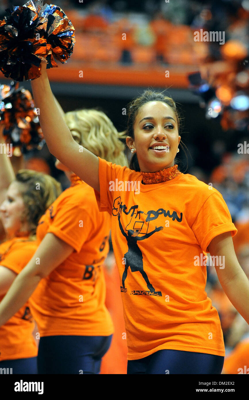 A member of the Syracuse dance team performs court side during pre-game ...