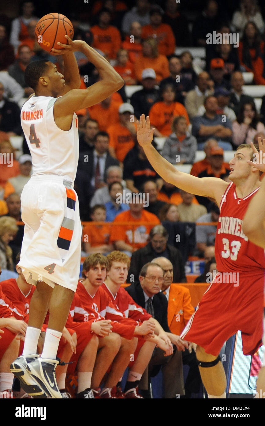 Syracuse forward Wesley Johnson (4) takes the three point shot over ...