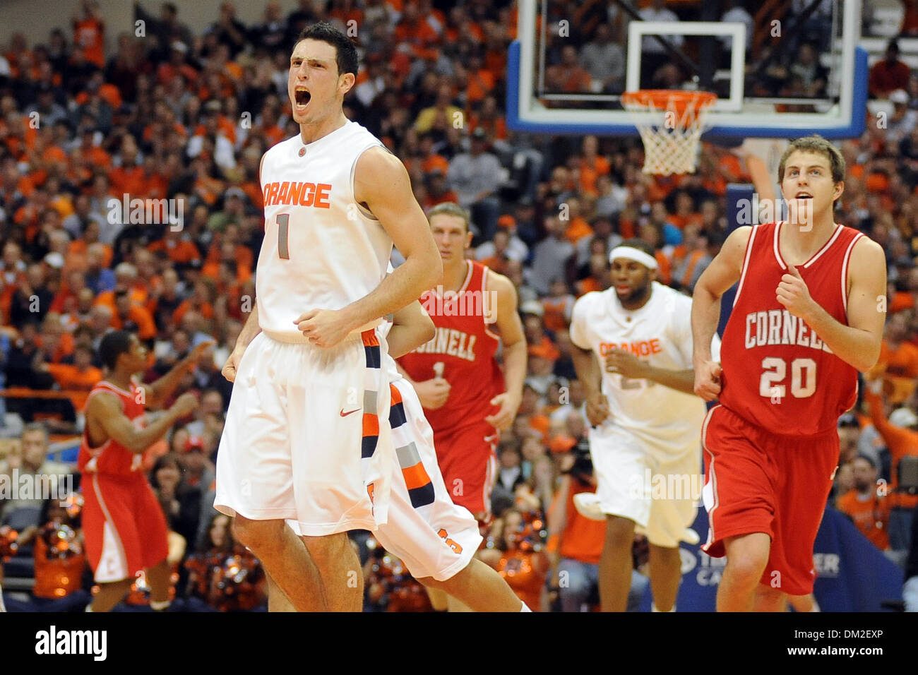 Syracuse guard Andy Rautins (1) celebrates after draining the three ...
