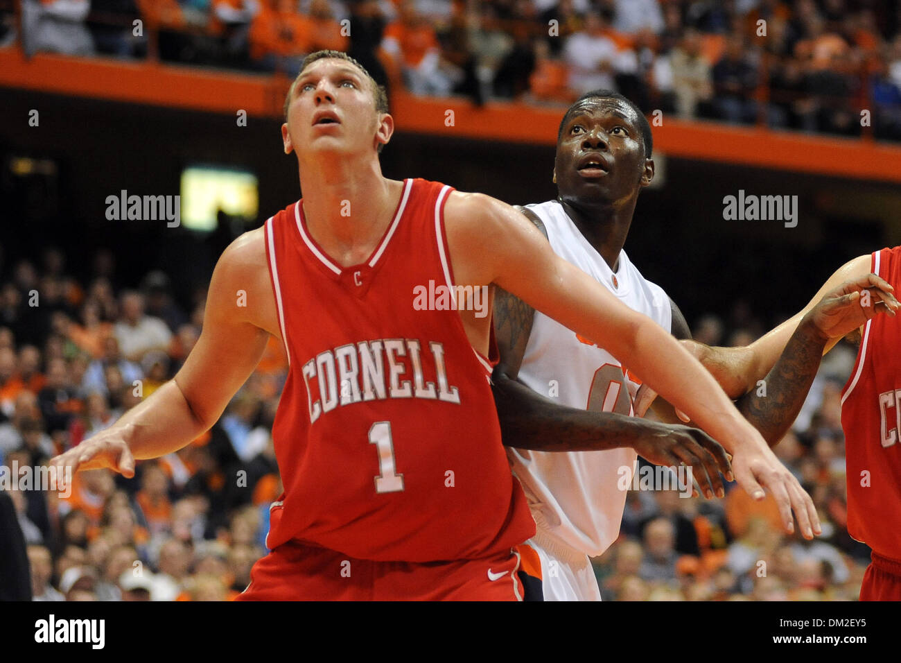Cornell center Jeff Foote (1) boxes out Syracuse forward Rick Jackson ...