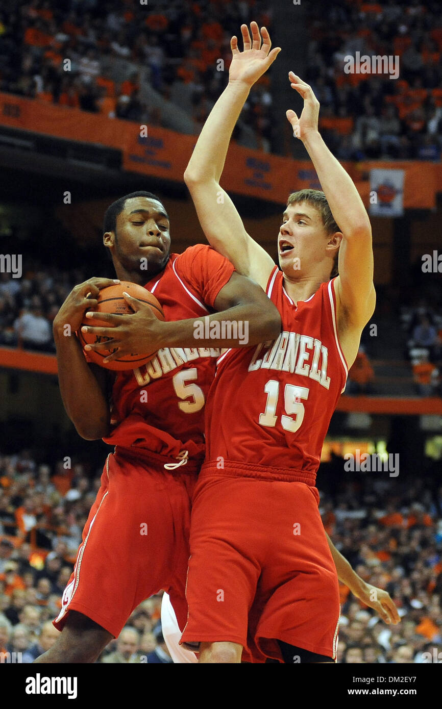 Cornell forward Errick Peck (5) grabs the rebound from Cornell guard ...