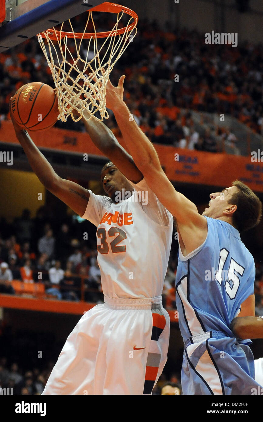 Syracuse forward Kris Joseph (32) pulls down the first half rebound in ...