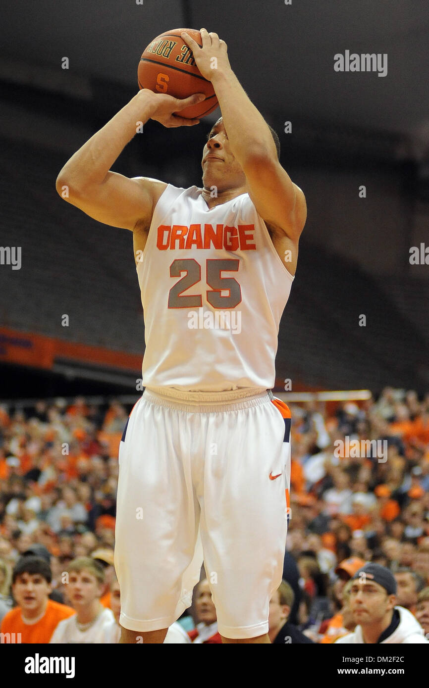 Syracuse guard Brandon Triche (25) takes the wide open three from the ...