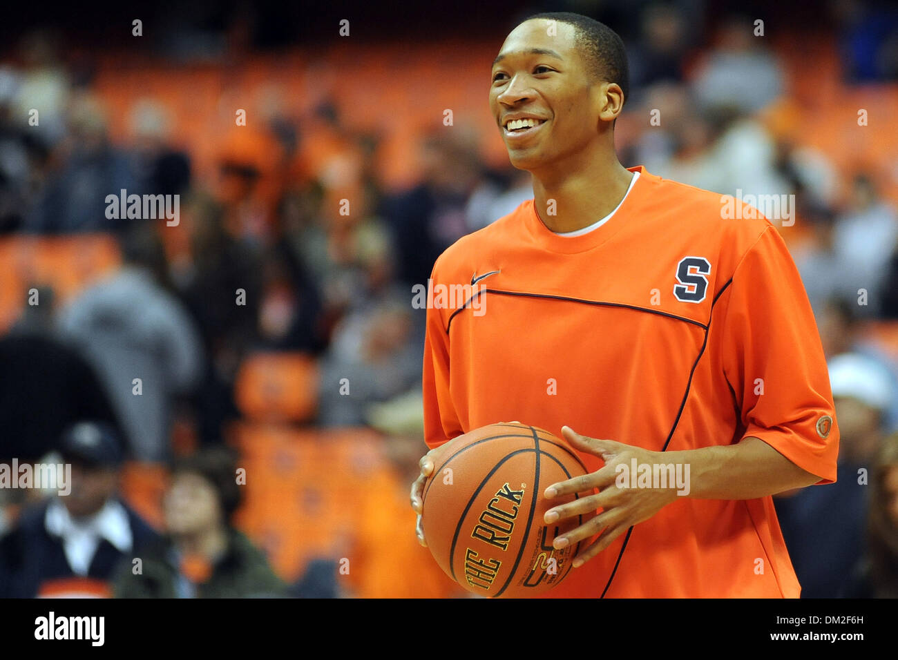 Syracuse forward Wesley Johnson is all smiles during pre-game warm ups ...