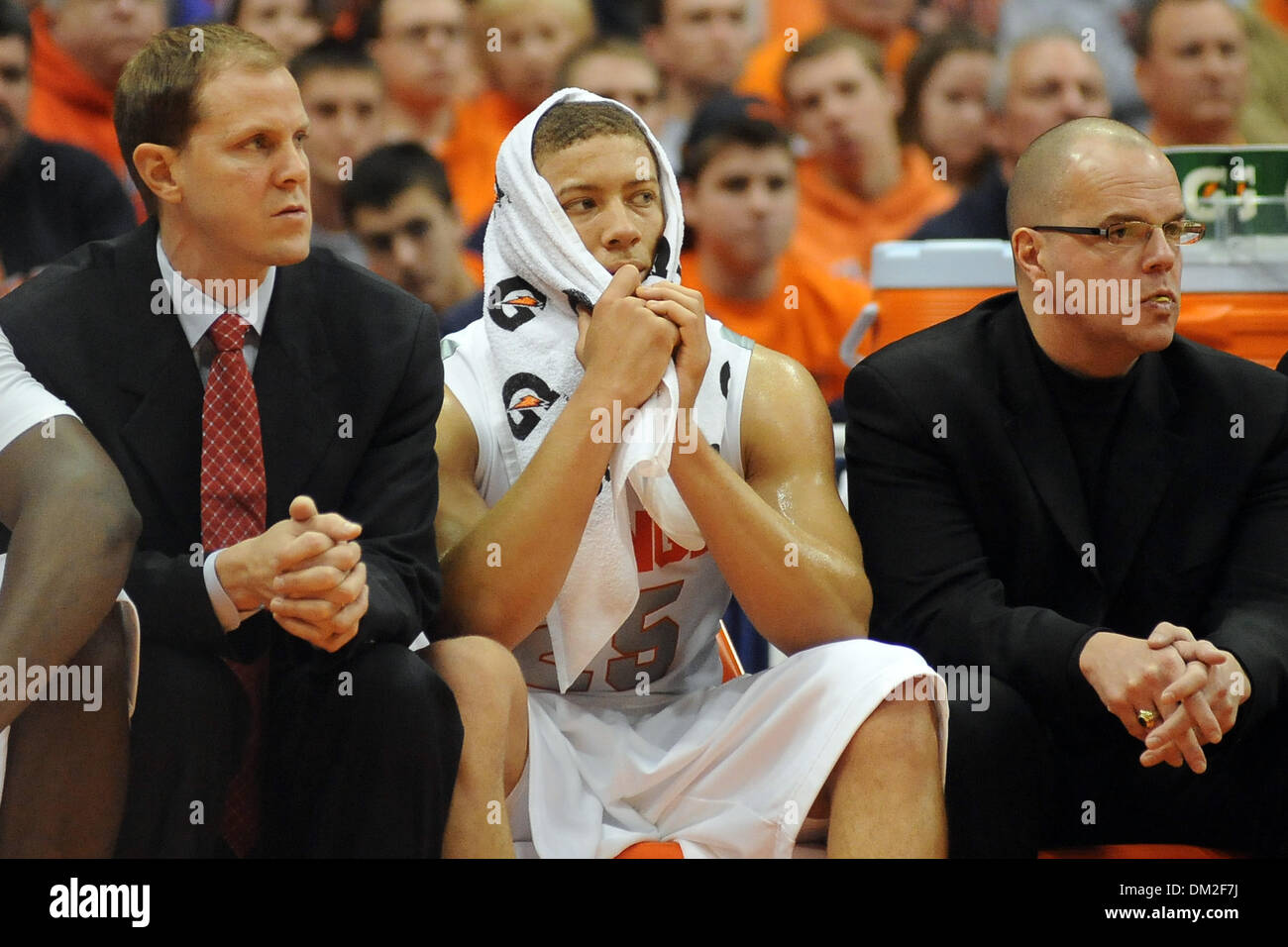 Syracuse guard Brandon Triche (25) wraps his head in a towel in the ...