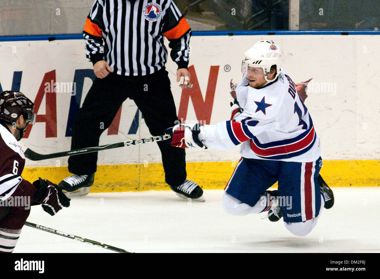 Rochester Americans Michael Duco (#14) leaves his feet as he takes a ...