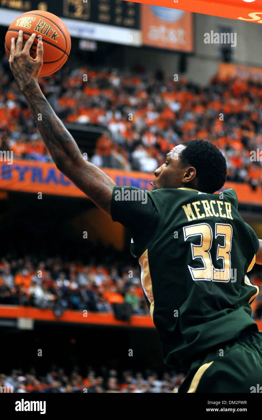 South Florida guard Mike Mercer (33) saves the ball as it heads out of ...