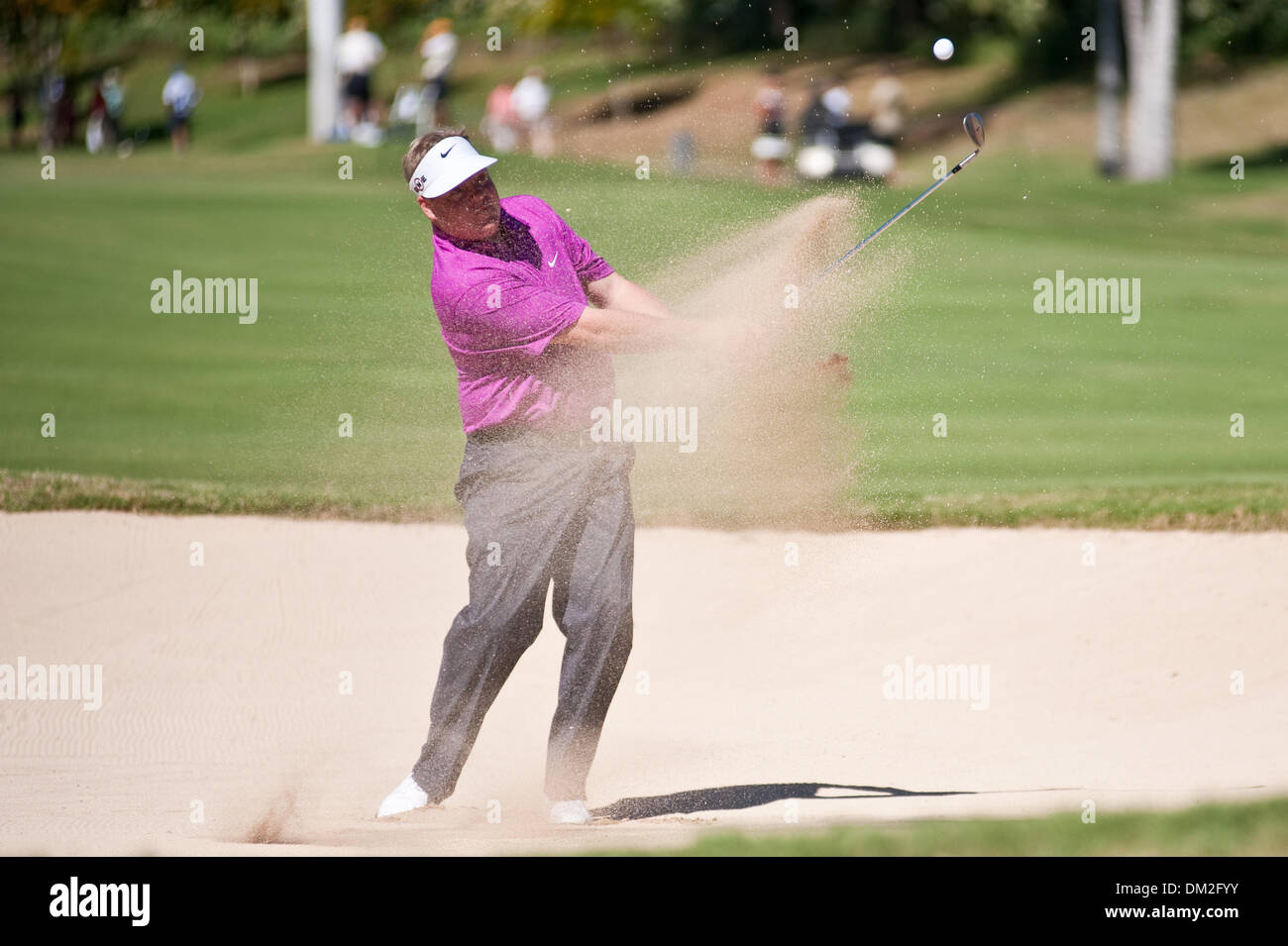 Carl Patterson hits out of a bunker during second round action. The ...