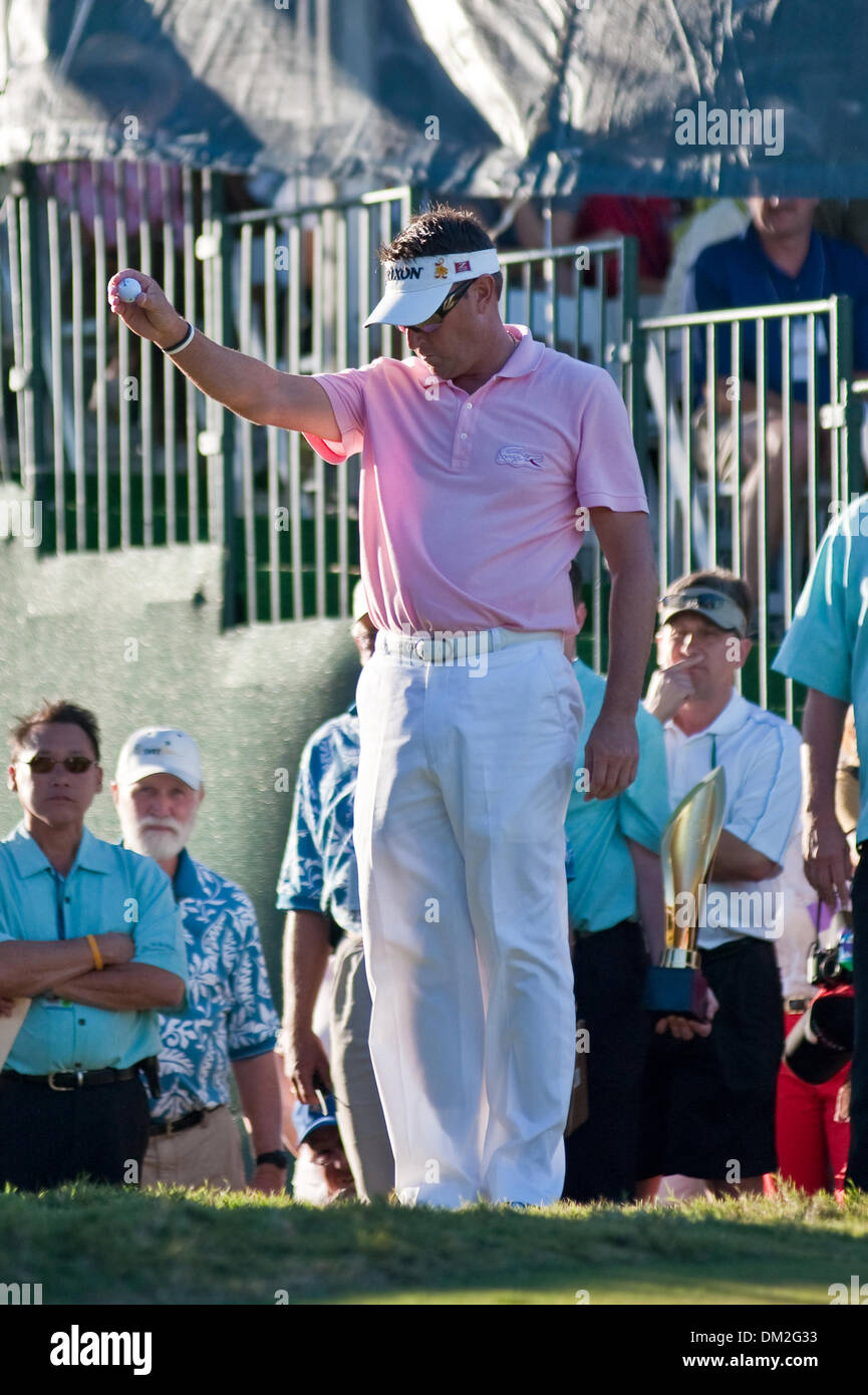 Robert Allenby takes a drop on the 18th hole at Waialae. The final ...