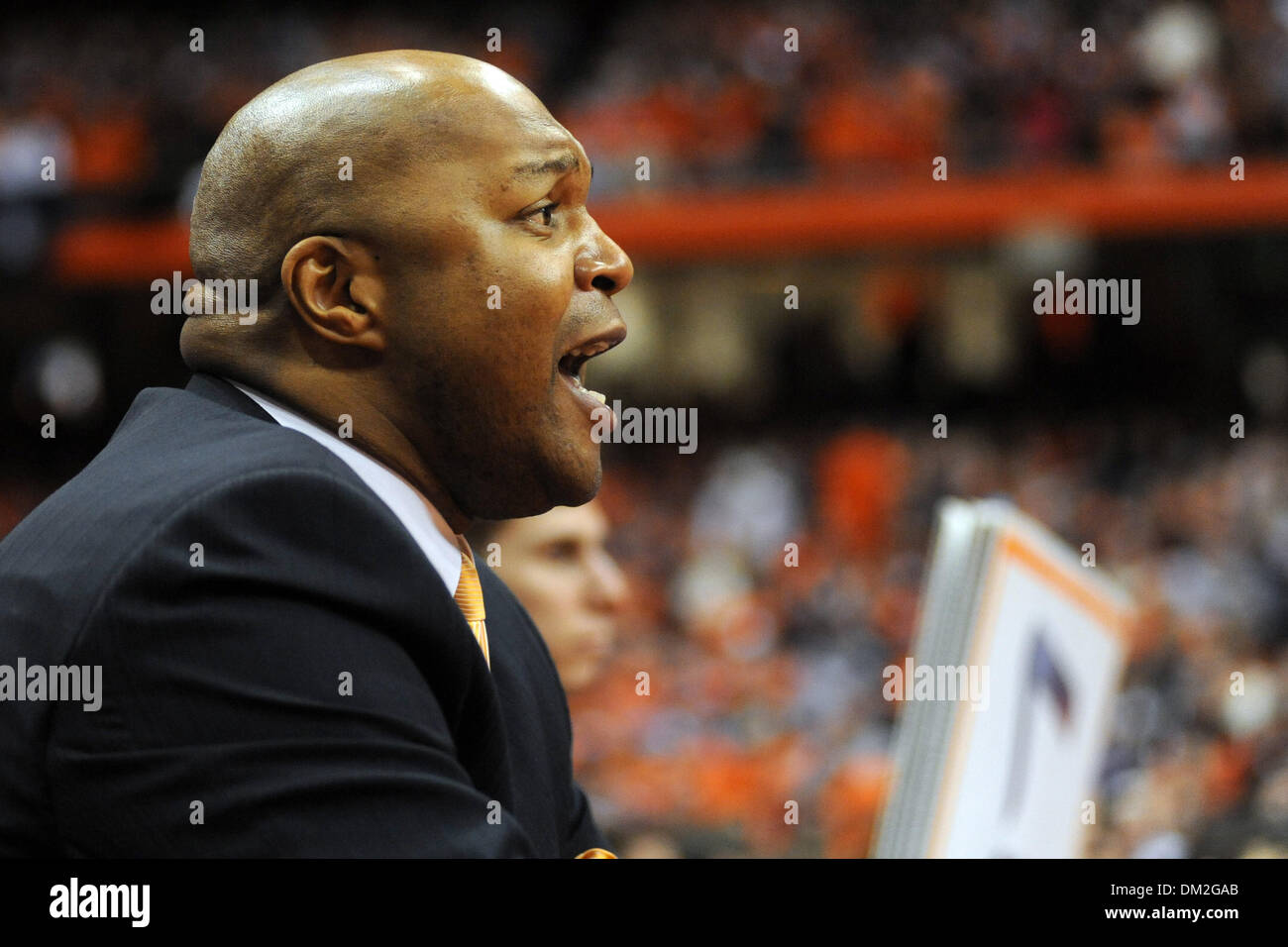 Syracuse legend Derrick Coleman cheers on the Orange in the first half ...