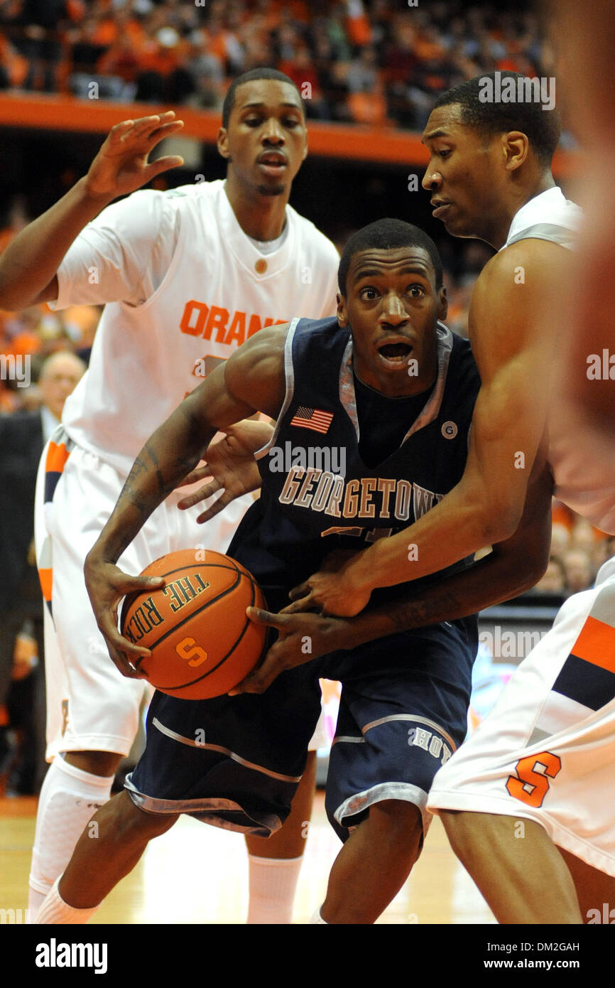 Georgetown guard Jason Clark (21) looks up at an official while being ...