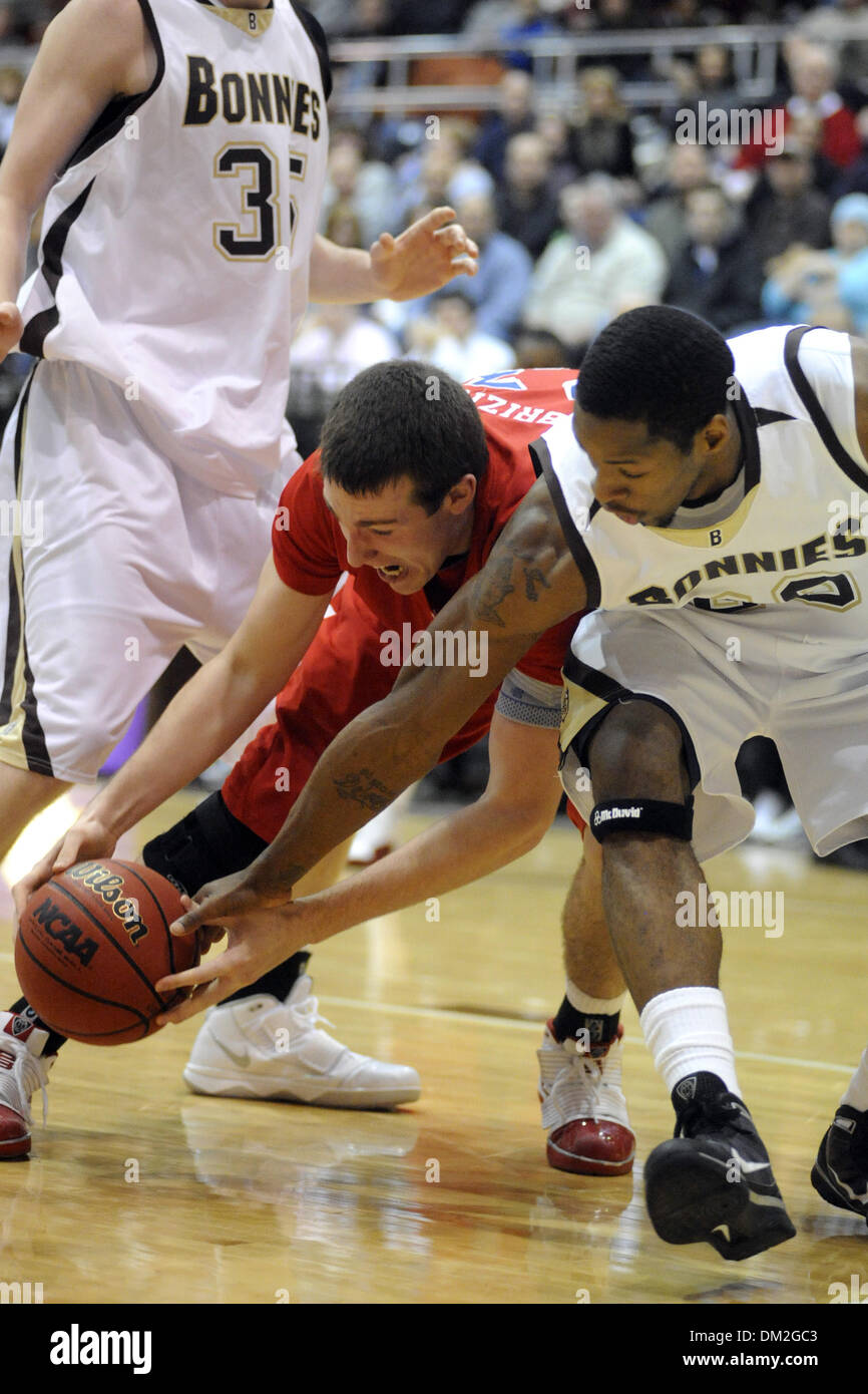 St. Bonaventure guard Malcolm Eleby (right) gets a hand on the ball as ...