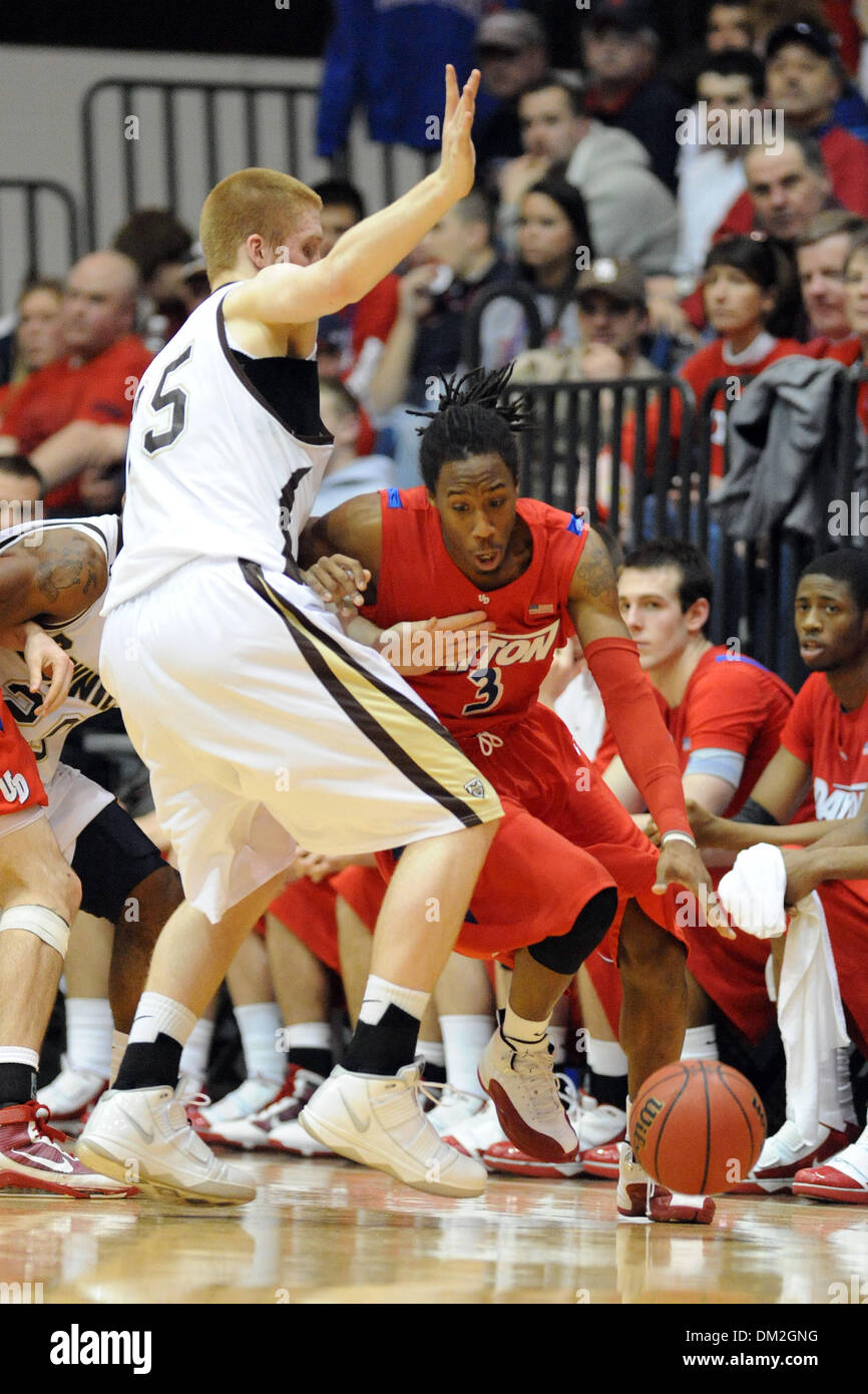 Dayton guard Rob Lowery (3) tries to drive around St. Bonaventure ...