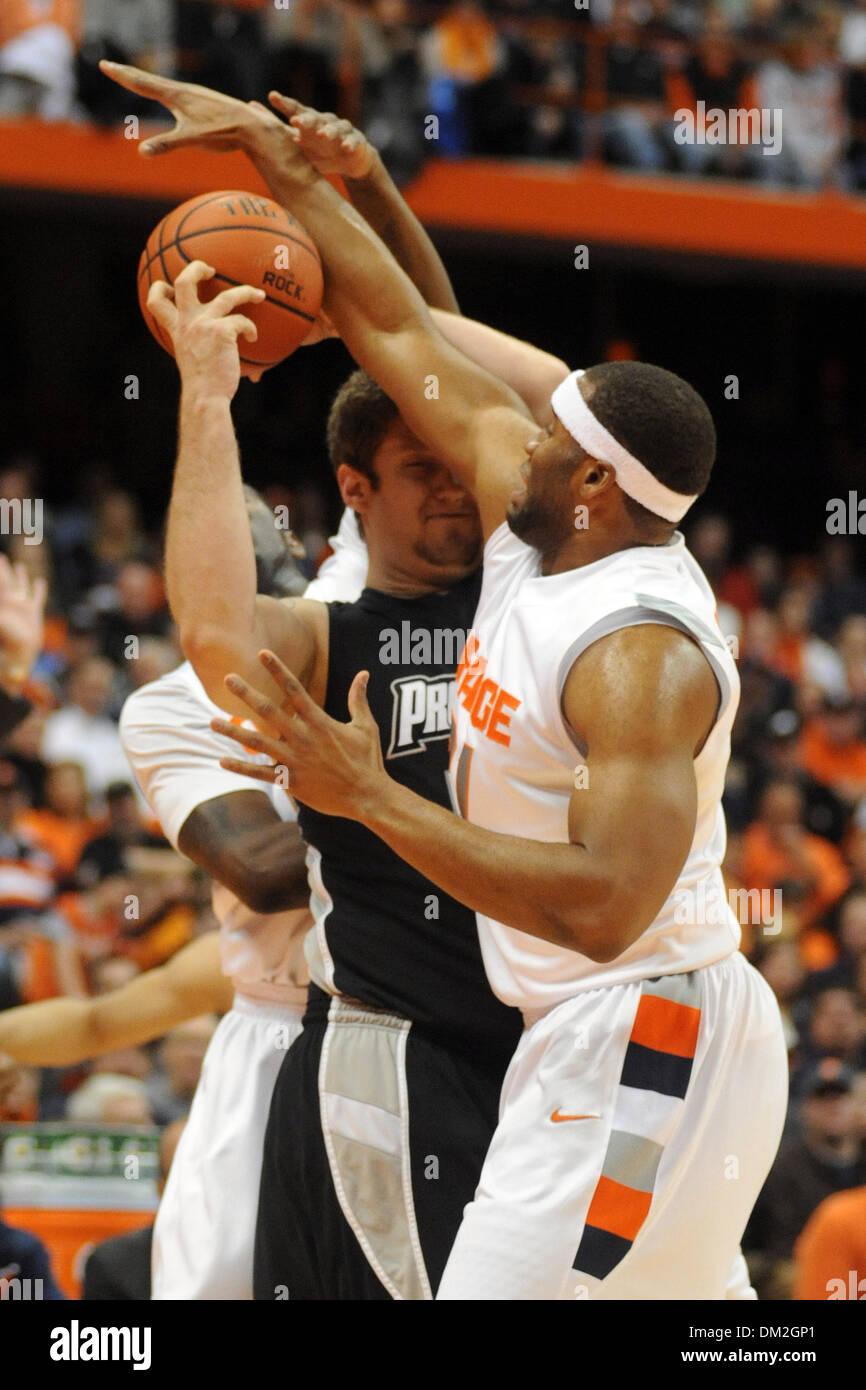 Providence center Ray Hall (middle) gets the ball knocked away by ...