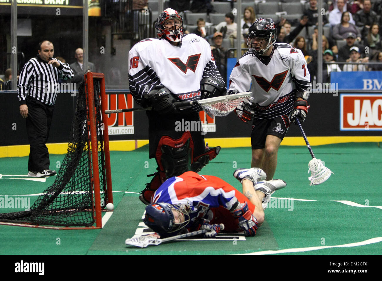 Toronto Rock forward Colin Doyle (7) falls after scoring in a lacrosse ...