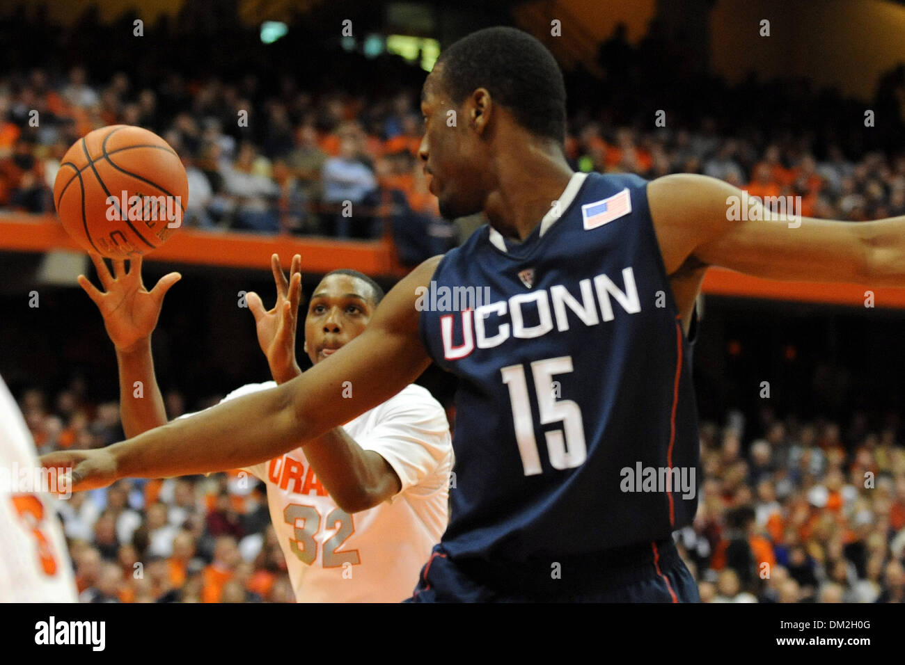 Syracuse forward Kris Joseph (32) catches the inbound pass behind the ...