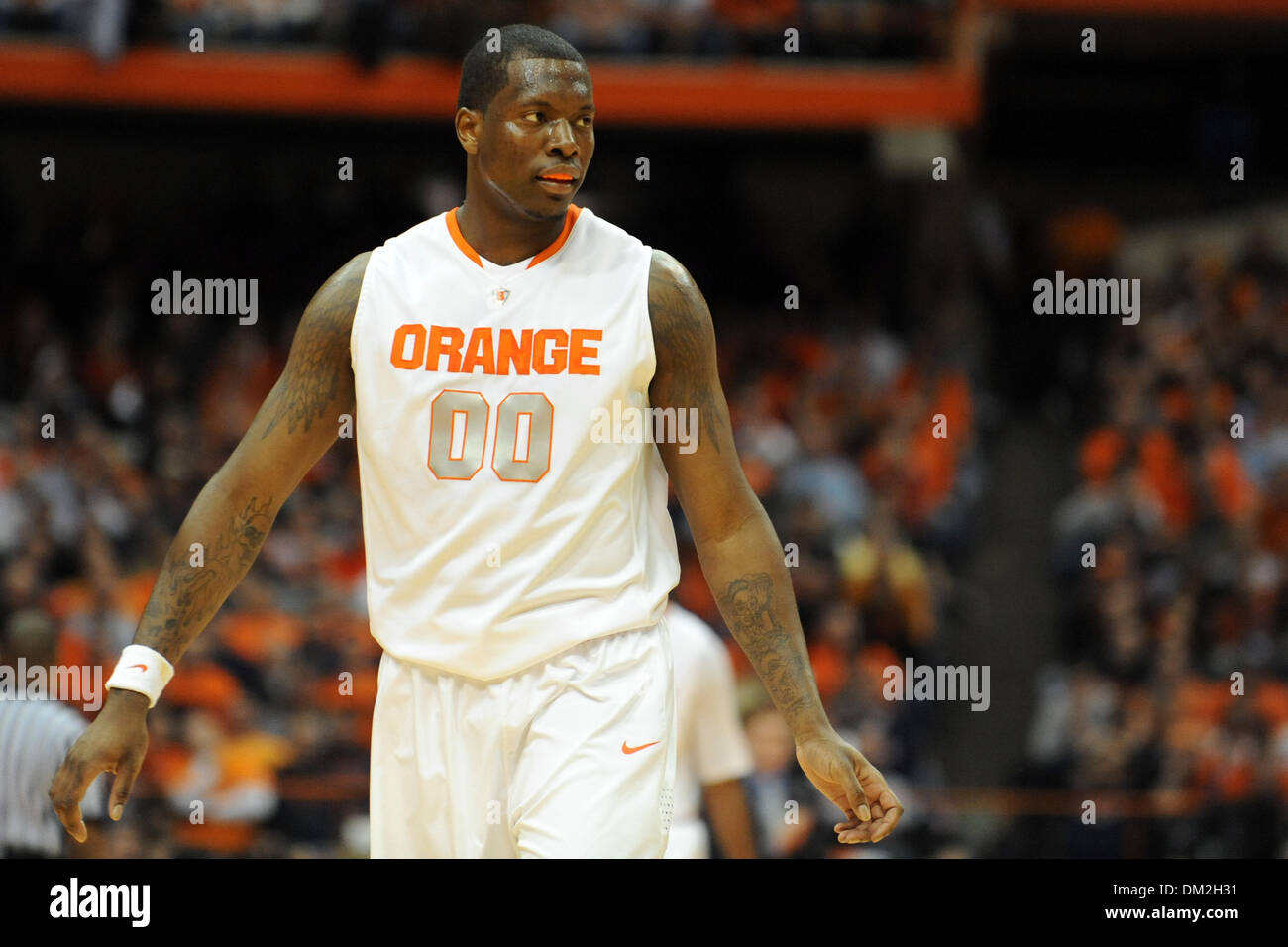 Syracuse forward Rick Jackson (0) walks up court after being called for ...