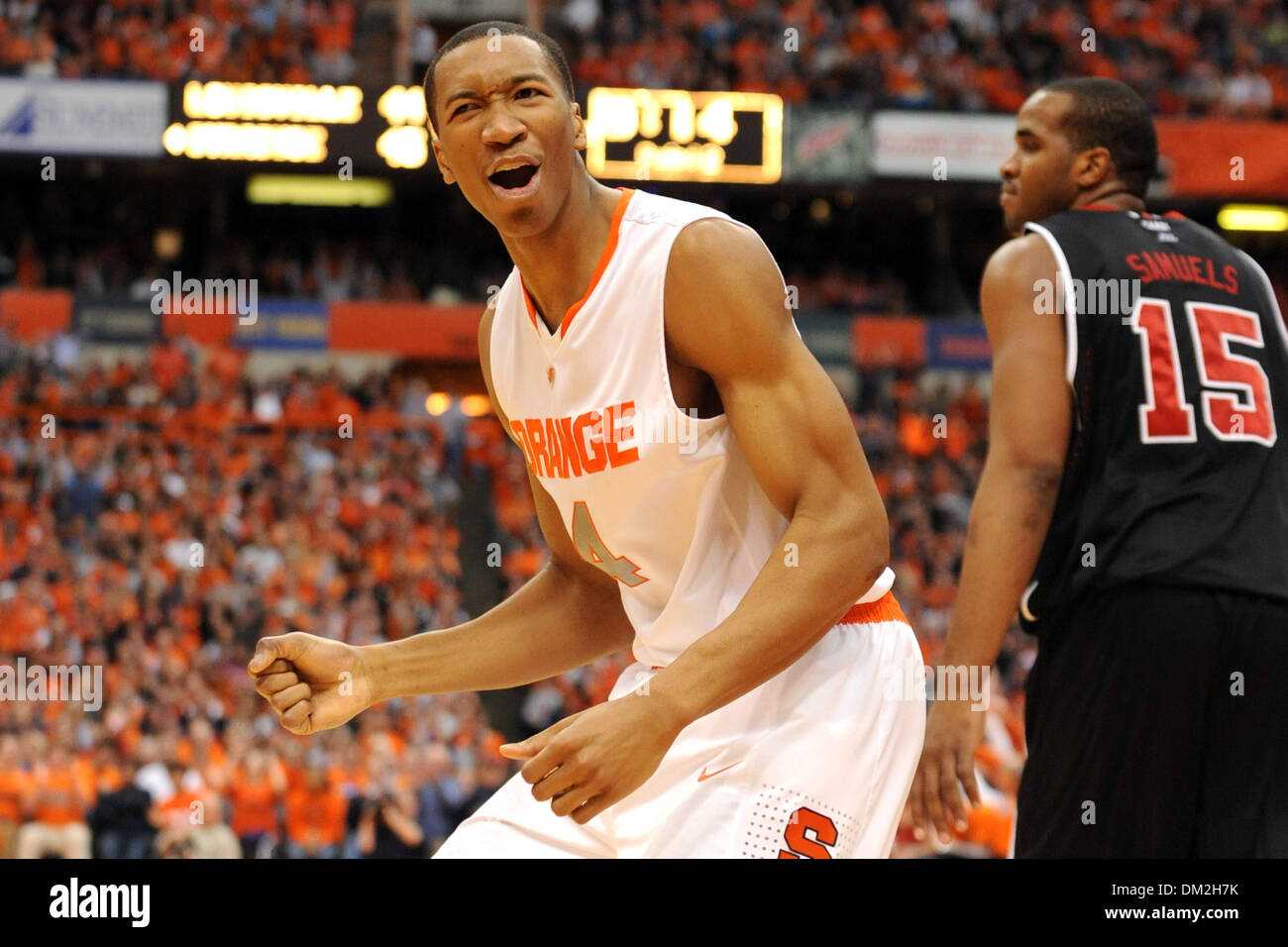 Syracuse forward Wesley Johnson (4) celebrates hitting the three point ...