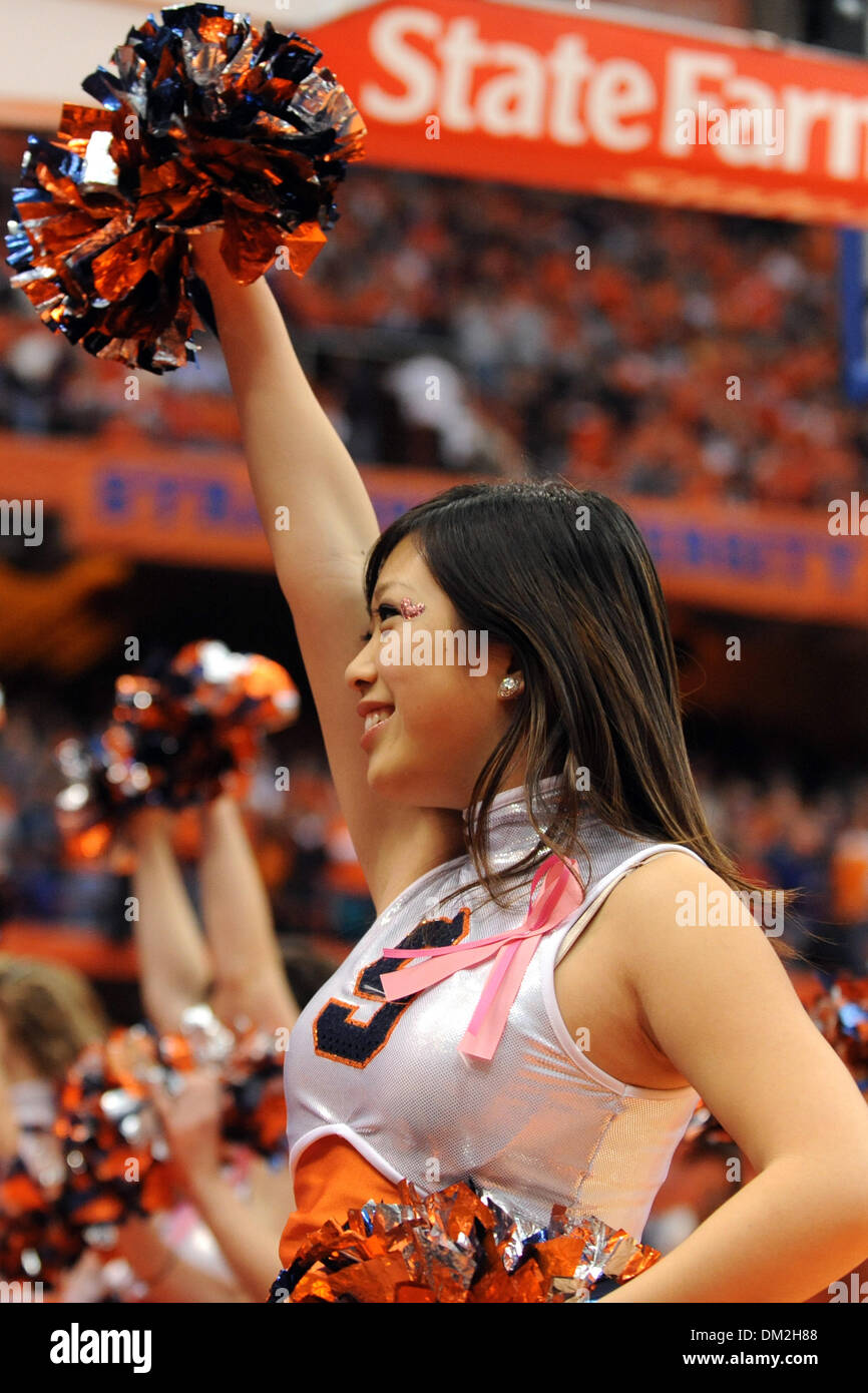 A member of the Syracuse dance team performs from the baseline before ...