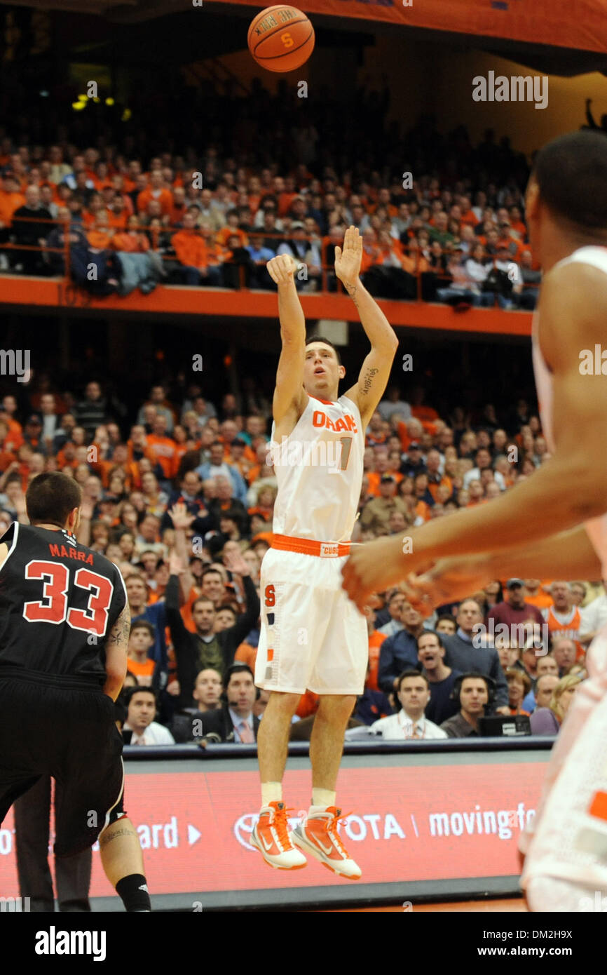 Syracuse guard Andy Rautins (1) launches the wide open three point shot ...