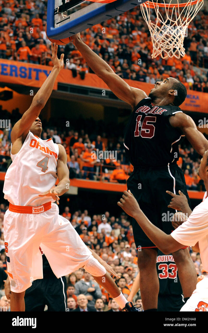 Louisville forward Samardo Samuels (15) blocks the late game shot by ...