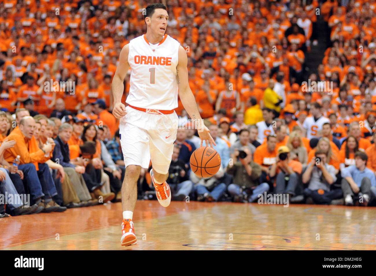 Syracuse guard Andy Rautins (1) leads the Orange offense up court in ...