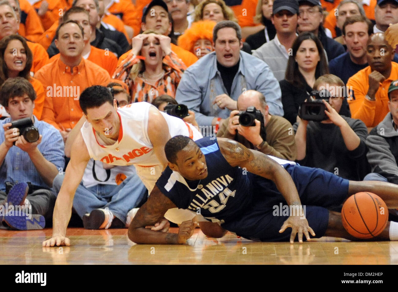 Villanova guard Corey Stokes (24) and Syracuse guard Andy Rautins (1 ...