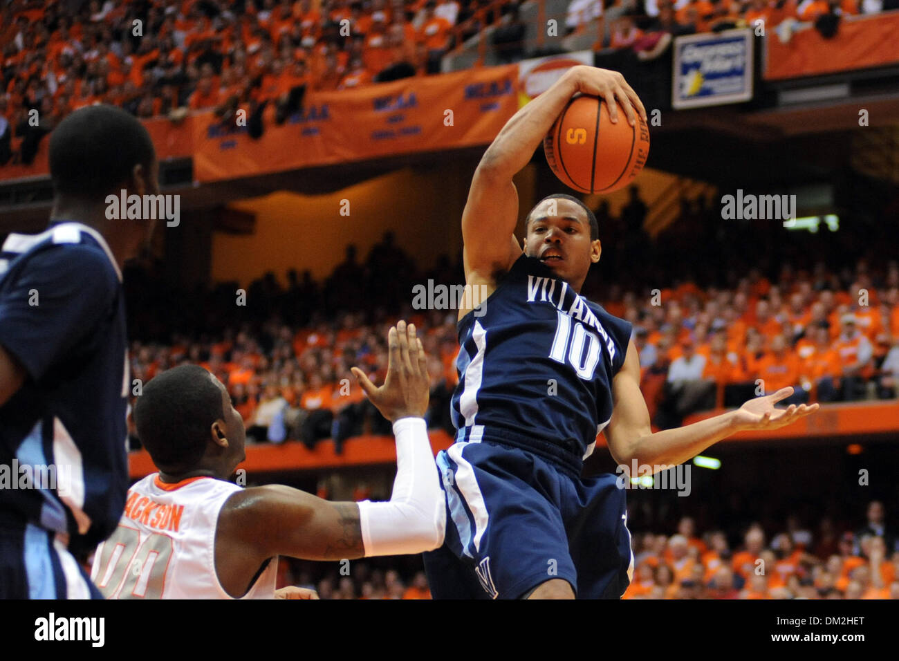 Villanova guard Corey Fisher (10) hauls in the rebound in the first ...