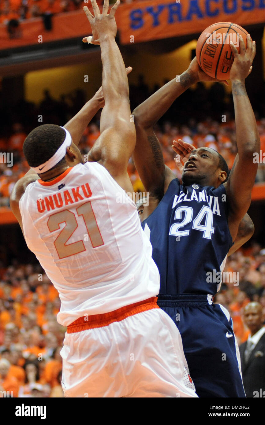 Villanova guard Corey Stokes (24) takes the shot over Syracuse forward ...