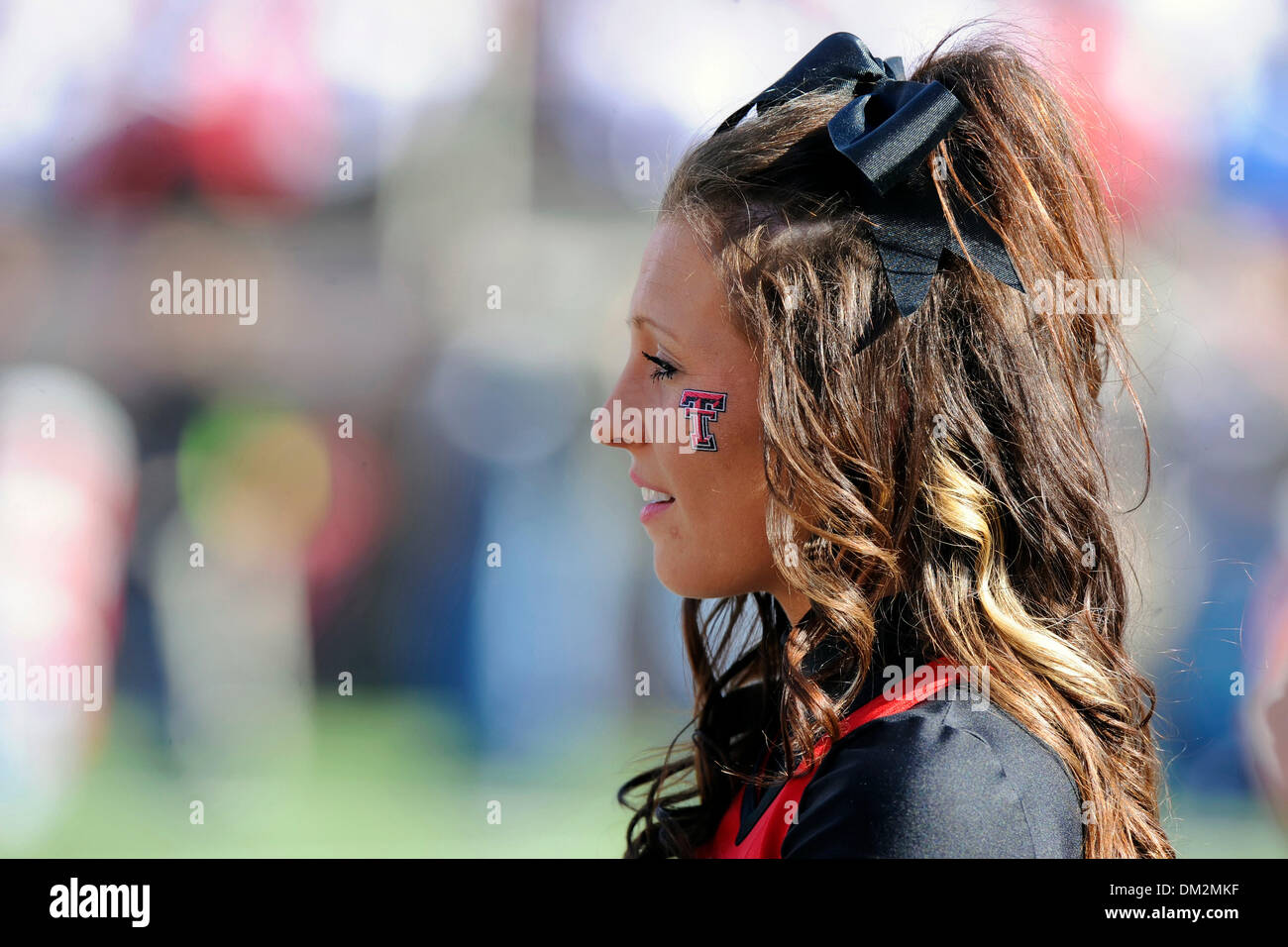 Members of the Texas Tech cheer squads cheering as the Texas Tech Red ...