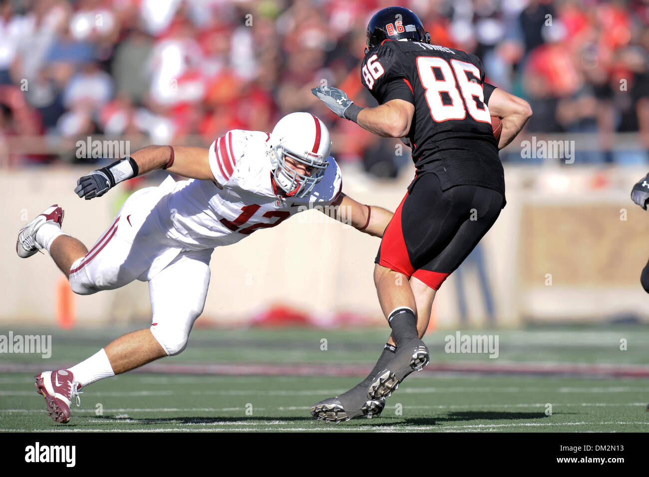 Oklahoma LB Austin Box (12) looks to tackle Texas Tech WR Alexander ...