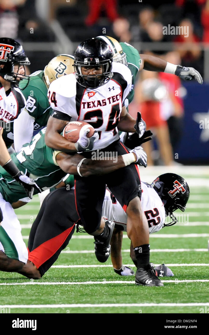 Texas Tech RB Eric Stephens (24) blasts through the line of scrimmage ...