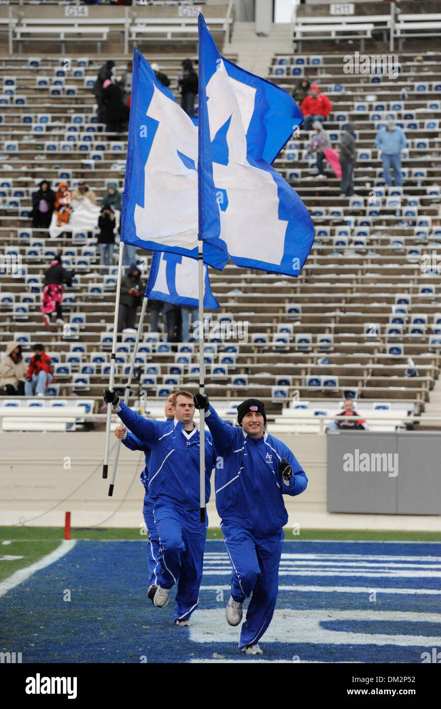 The Air Force Academy runs the flags after a late touchdown run in the ...