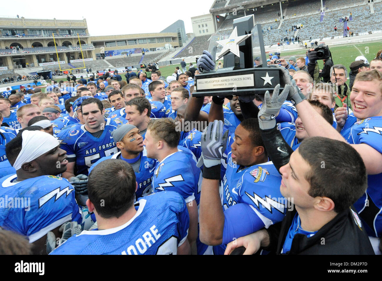 The Falcons team celebrates their team victory in the game between #25 ...