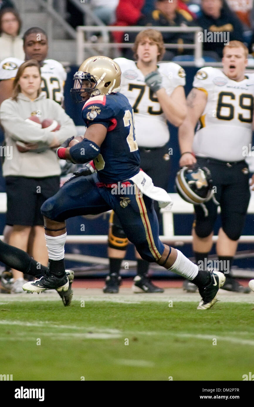 Navy running back Marcus Curry streaks down the sidelines for a first ...