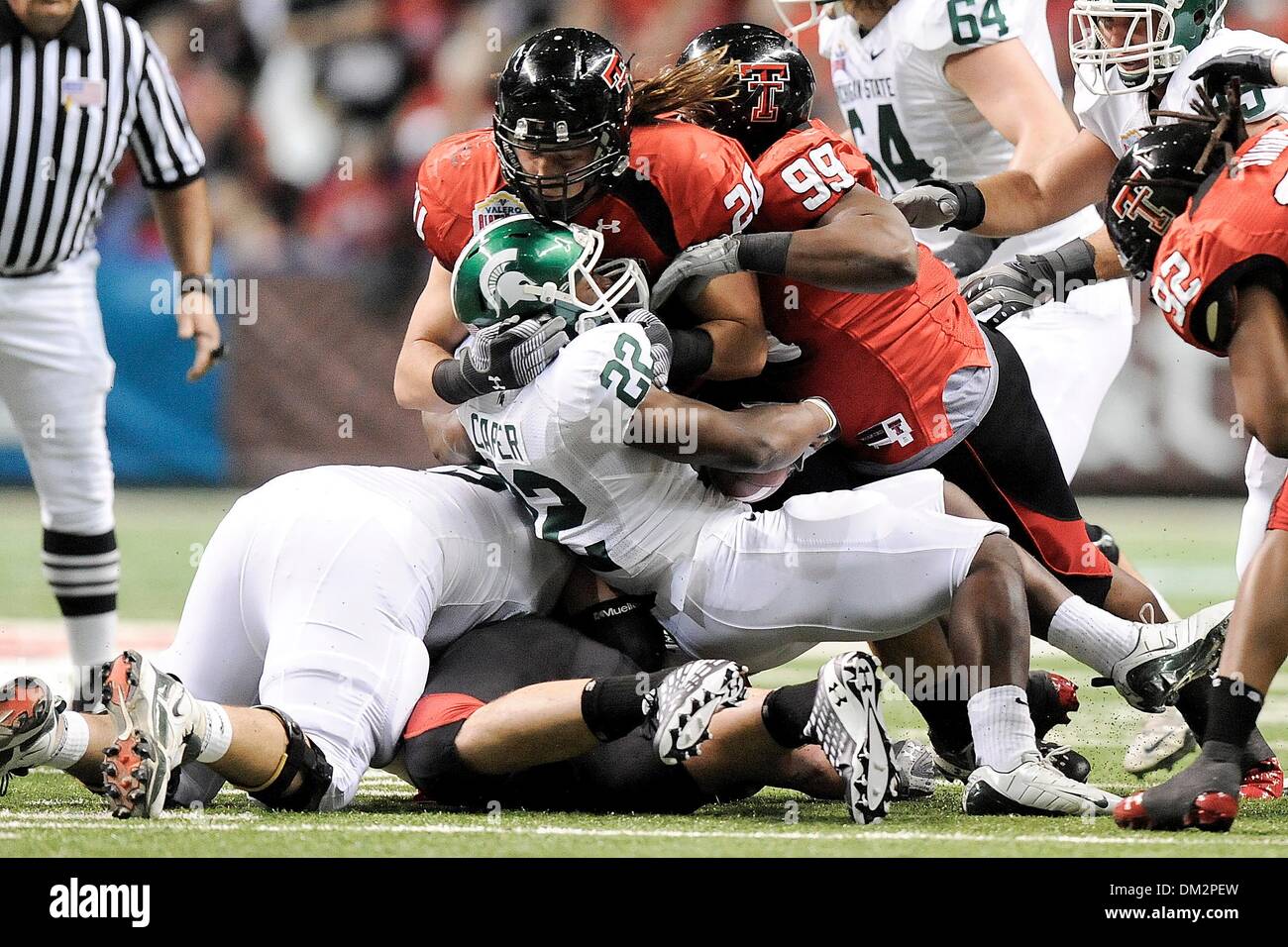 Texas Tech LB Bront Bird (20) makes a key stop on Michigan State ...