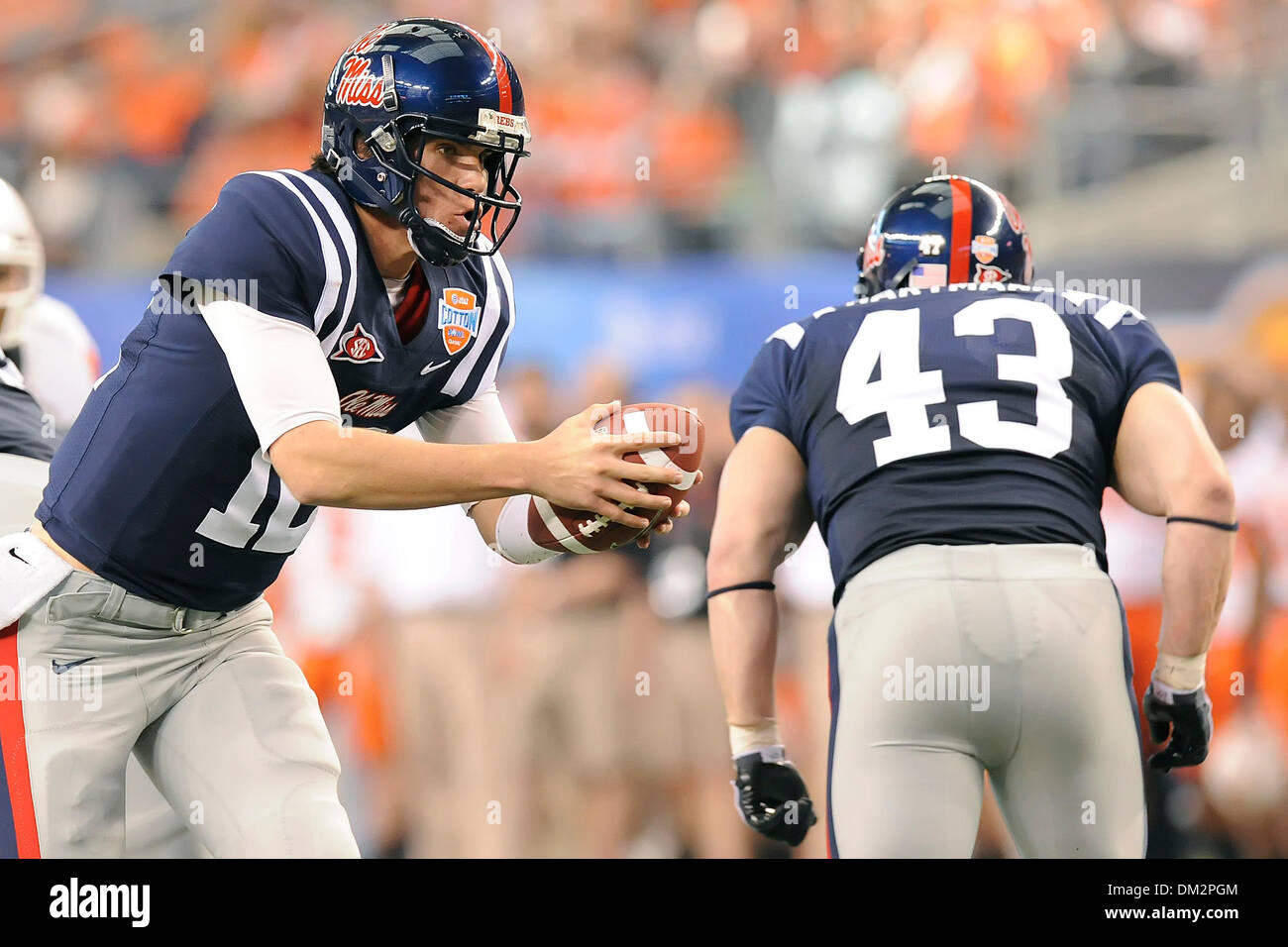 Mississippi quarterback Nathan Stanley (12) looks to hand off the ball ...