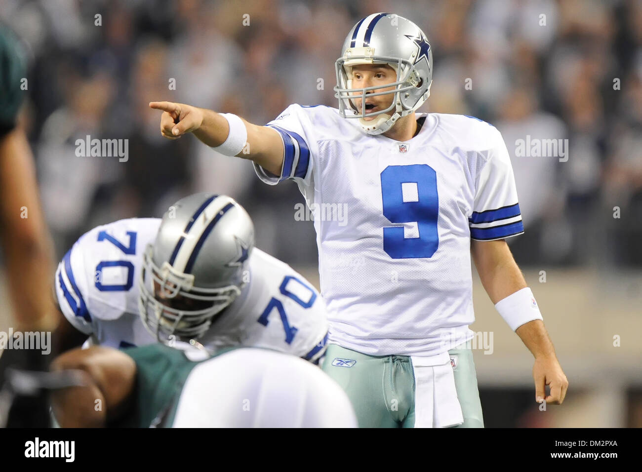Dallas Cowboys quarterback Tony Romo (9) points out a defender in first ...