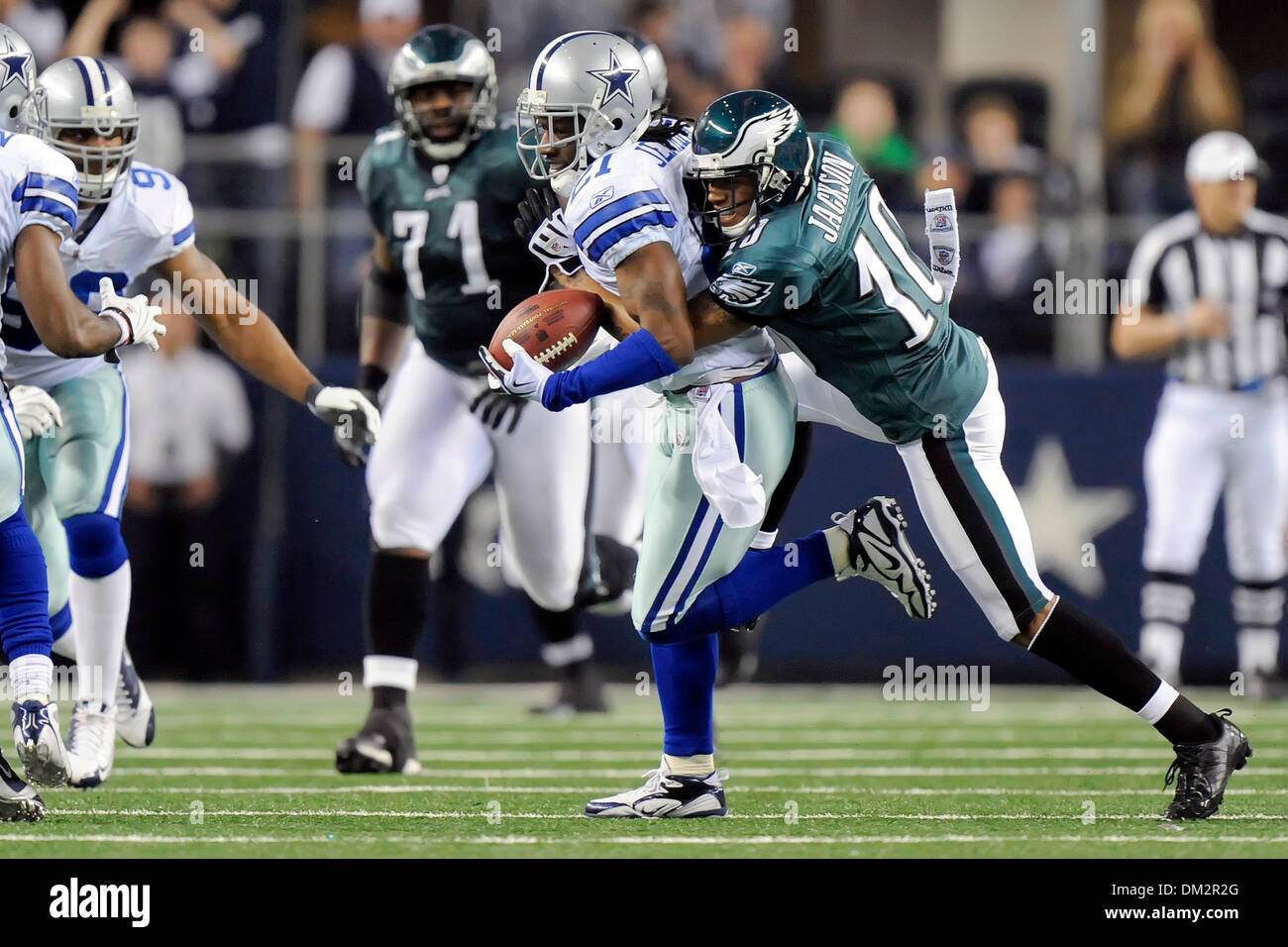 Dallas Cowboys cornerback Mike Jenkins (21) makes the interception then ...